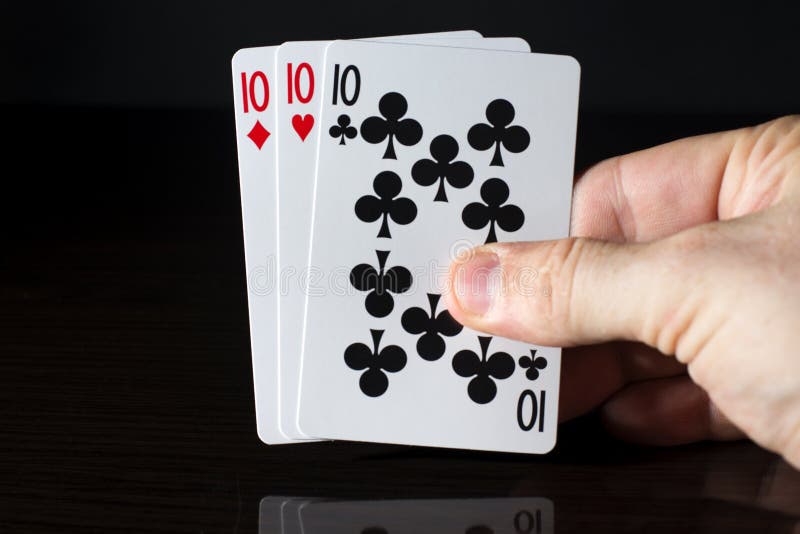 Man holding cards in hand. stock photo. Image of hazard - 47381564