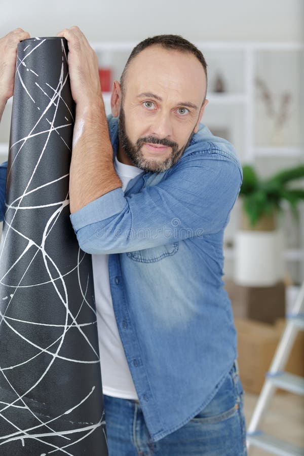 Man Holding Carpet during Diy Stock Photo - Image of carpet, brush ...