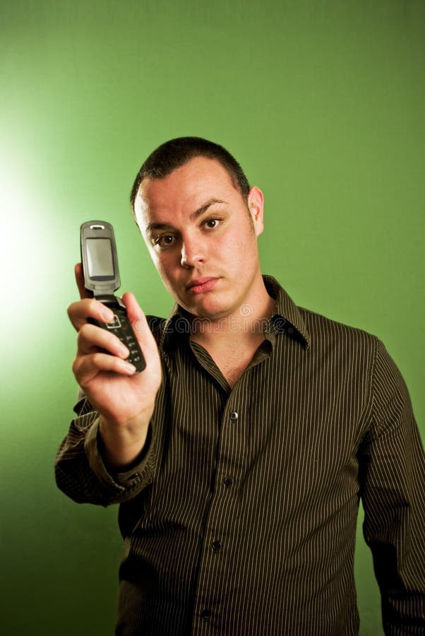 Young man on cell phone stock image. Image of electronics - 3520863