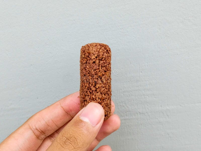 Man Holding Cereal Snack in His Hand. Stock Photo - Image of brownies ...