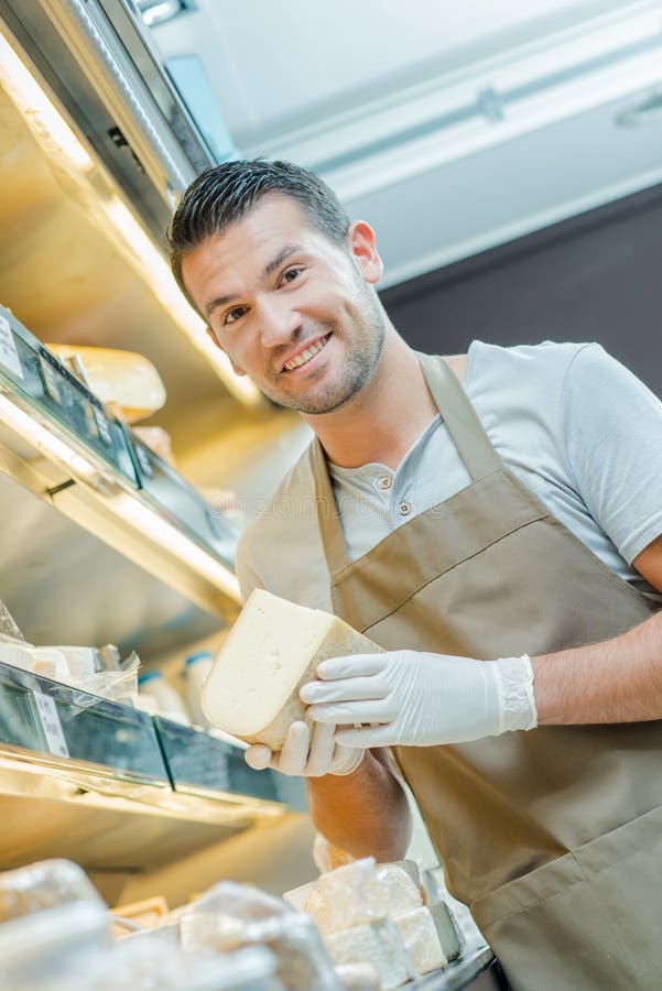 Man holding cheese stock photo. Image of male, recommend - 227972680