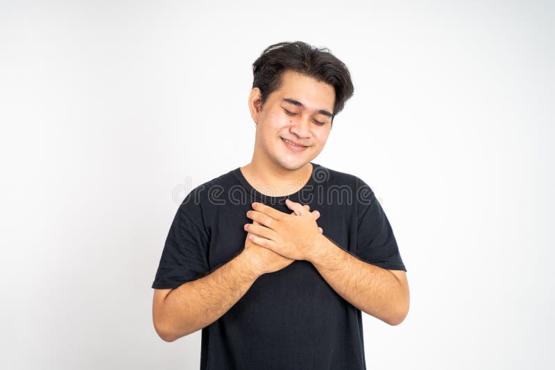 Man Holding Chest and Looking Up Comfortable Stock Photo - Image of ...