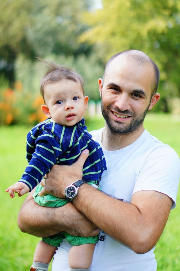 Man holding child stock photo. Image of child, smiling - 44524064