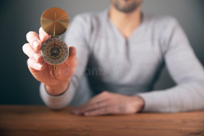 Holding a Compass in His Hand Stock Photo - Image of passport, hand ...