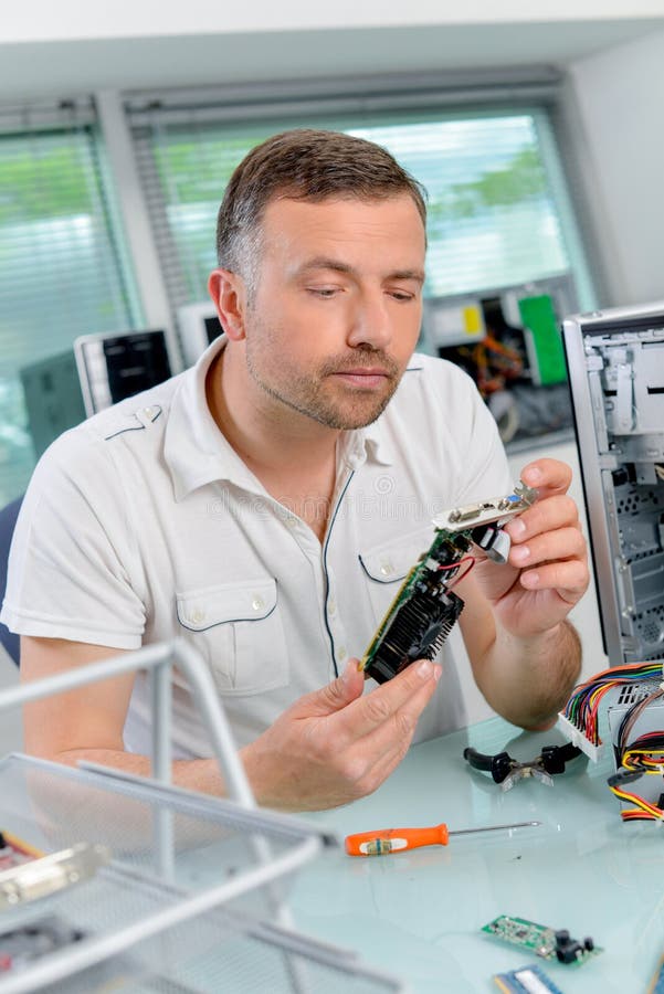 Man holding computer part stock image. Image of memory - 103623031