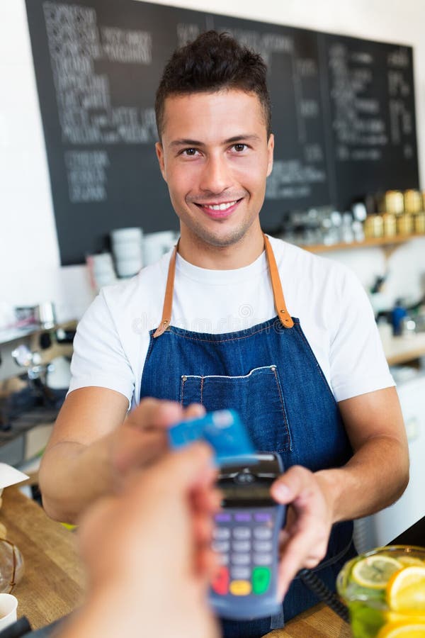 366 Man Holding Credit Card Reader Cafe Stock Photos - Free & Royalty ...