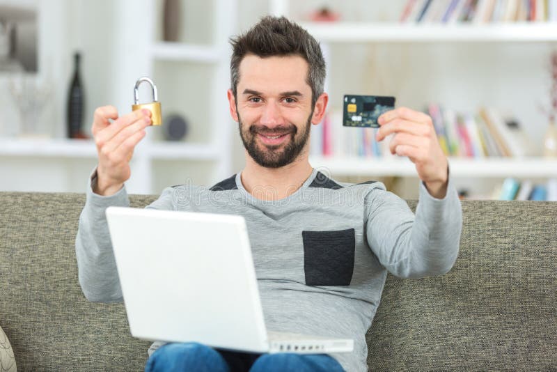 Man Holding Credit Card and Using Laptop Stock Image - Image of ... Man Holding Credit Card and Using Laptop Stock Image - Image of ...