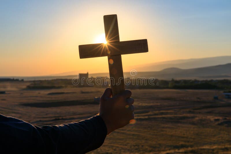 Man holding cross stock photo. Image of pray, silhouette - 215027174
