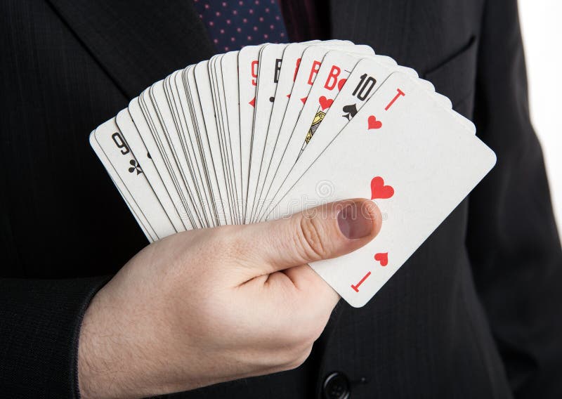 Man Holding a Deck of Cards in the Form of a Fan Stock Photo - Image of ...