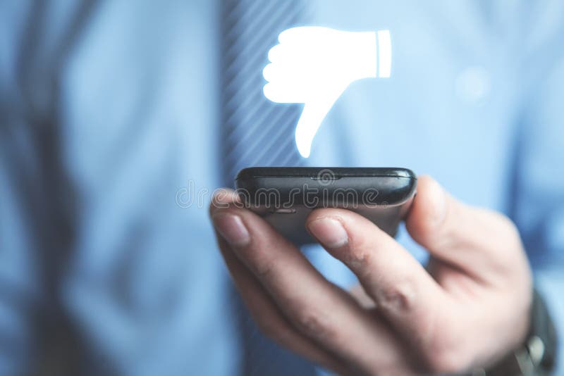 Man Holding Dislike Icon. Social Media Concept Stock Image - Image of ...