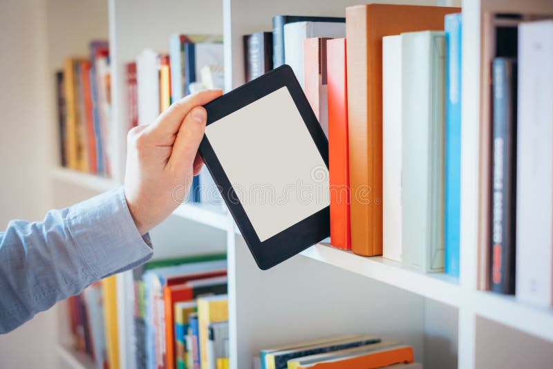 E-book Reader on a Stack of Books Stock Image - Image of background ...