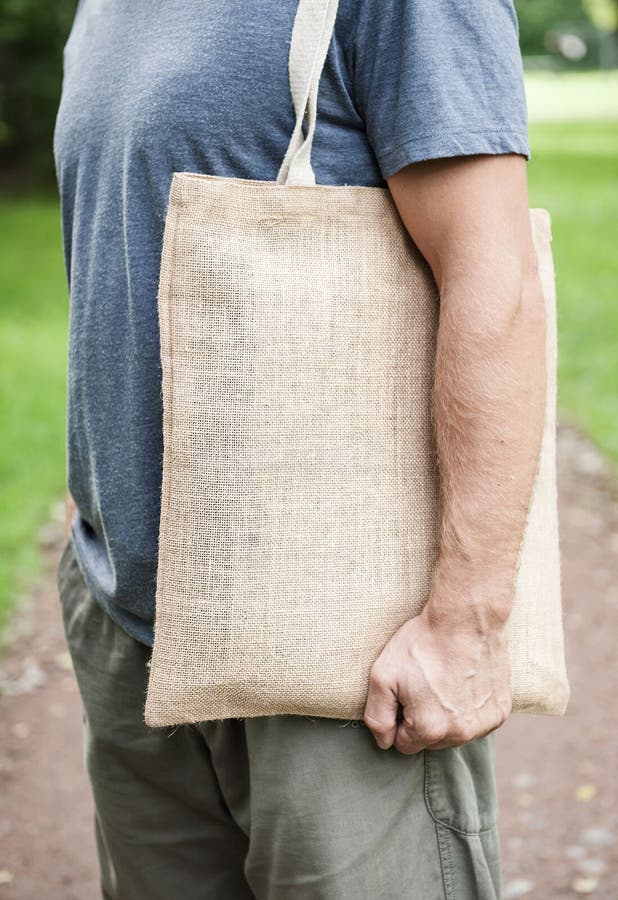 Man Holding Empty Canvas Bag. Template Mock Up Stock Photo - Image of ...