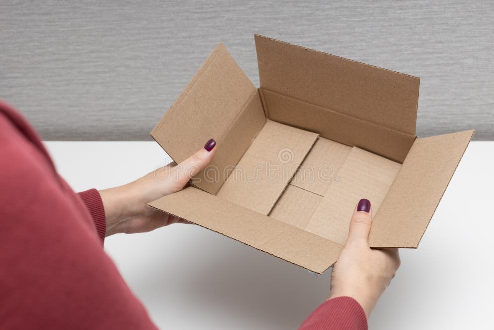 Man Holding an Empty Cardboard Box, Empty Box Stock Photo - Image of ...