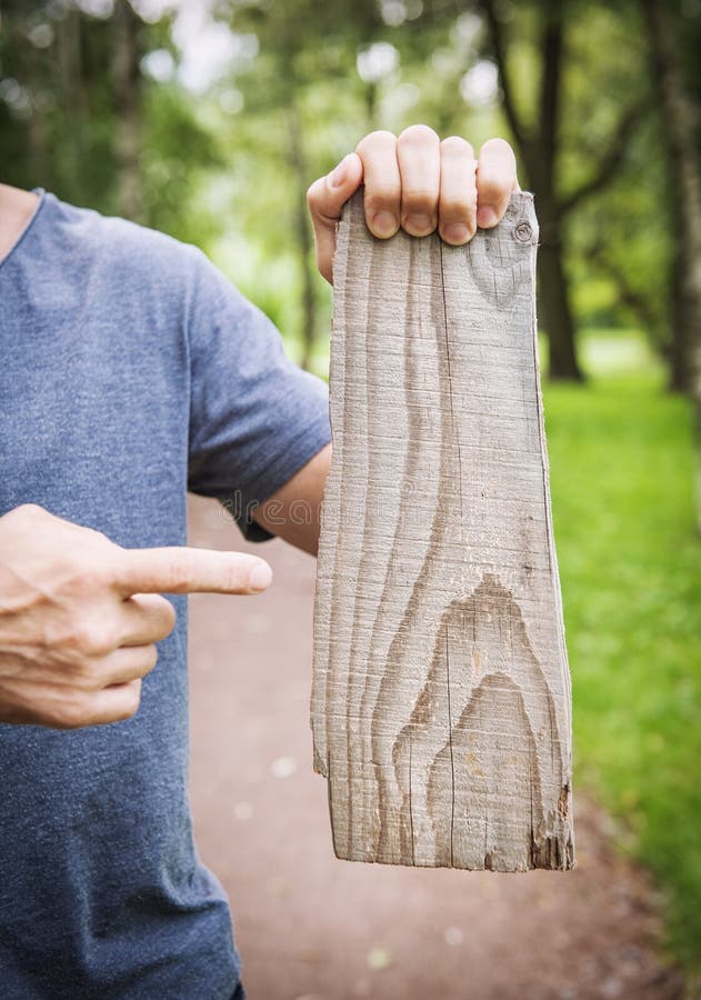 Man Holding Empty Wooden Board. Template Mock Up Stock Image - Image of ...
