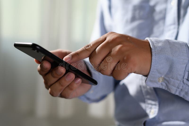 Man Holding En Hands and Using Digital Tablet Mobile Phone Telephone ...