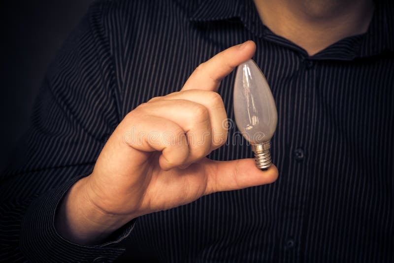 Man Holding Energy-saving Light Bulb Hand Stock Photo - Image of ...