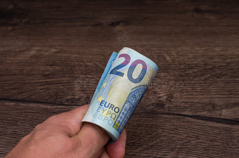 Man Holding 20 Euro Banknote Money in His Hands Stock Image - Image of ...