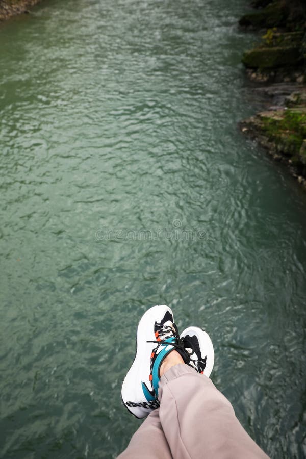 Man Holding Feet Over River, Top View Stock Photo - Image of male ...
