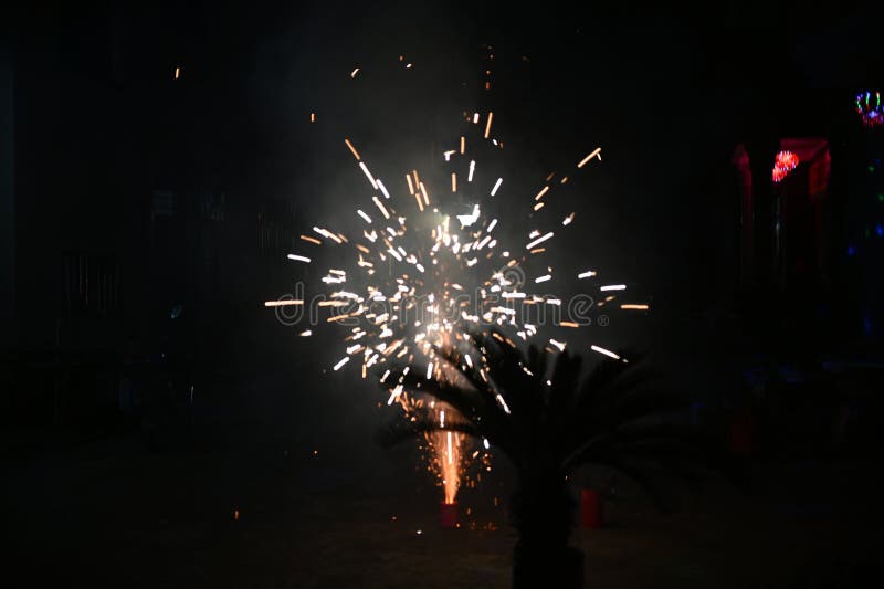 A Man Holding a Firework in His Hand at Night Stock Photo - Image of ...