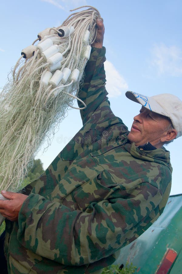 508 Hand Holding Fishing Net Stock Photos - Free & Royalty-Free Stock ...