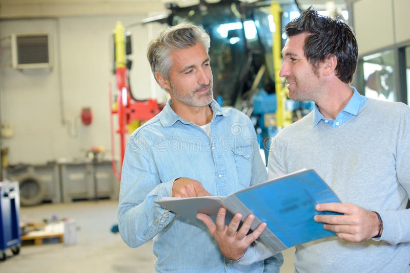 Man holding a folder stock photo. Image of inspect, information - 127758086