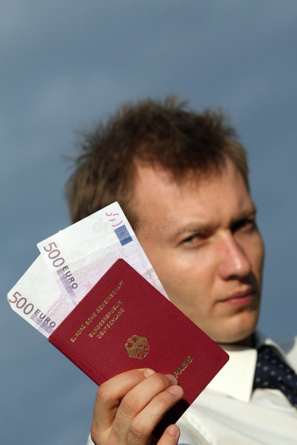 Man Holding German Pass with Money Stock Image - Image of custom, pass ...