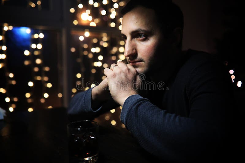 Man Holding Glass of Alcohol with Ice in a Night Club Stock Photo ...