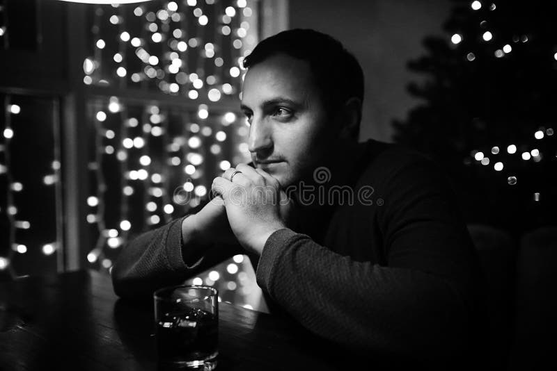 Man Holding Glass of Alcohol with Ice in a Night Club Stock Image ...