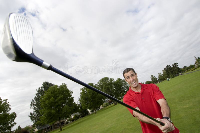 Man Holding Golf Club - Horizontal Stock Photo - Image of standing ...