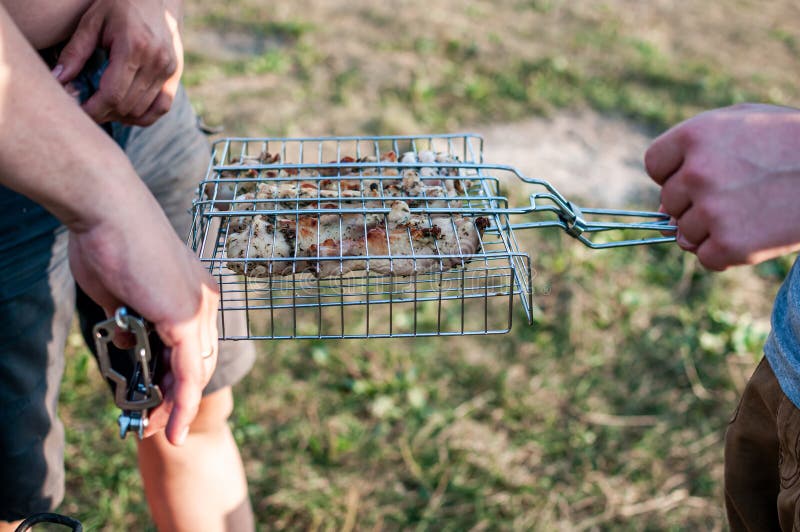 Man Holding Grid with Meat for the Barbeque Stock Image - Image of ...