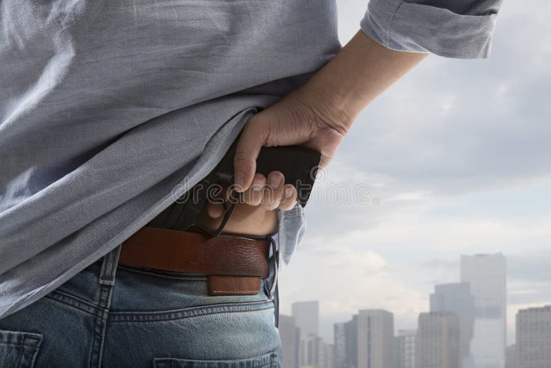 Gun Behind Back stock photo. Image of pistol, manslaughter - 1809138
