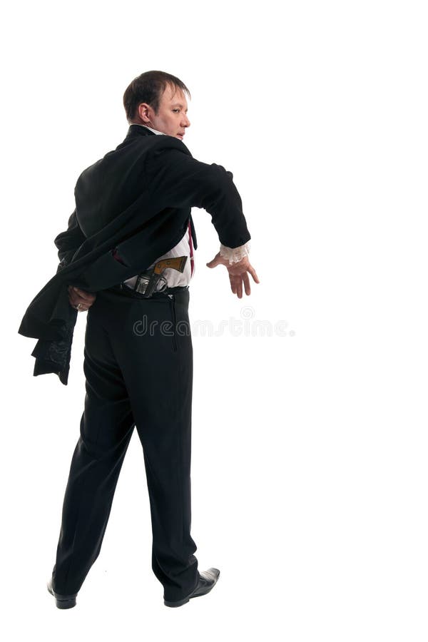 Man Holding a Gun Behind His Back Stock Photo - Image of business ...