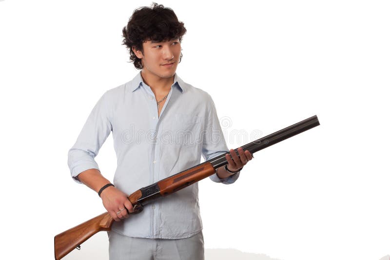 Man Holding Gun on a White Bg Stock Image - Image of model, photogenic ...