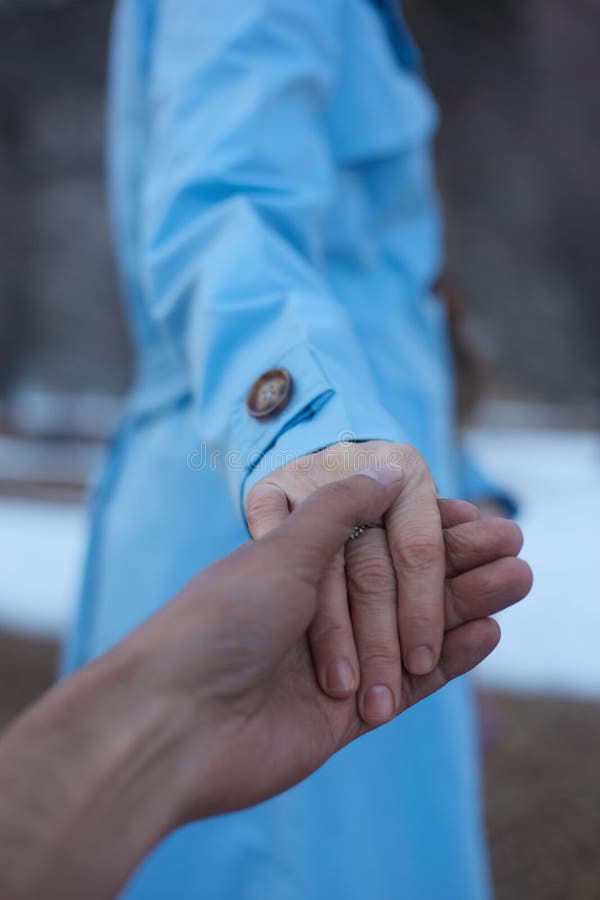 Man Holding the Hand of a Woman Stock Image - Image of fingers, holding ...
