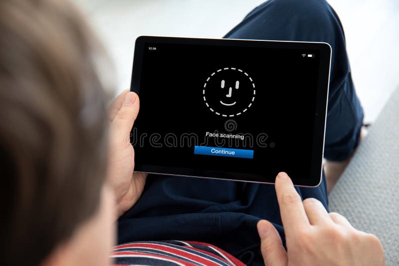 Man Holding in Hands Computer Tablet with Face Scanning Stock Image ...
