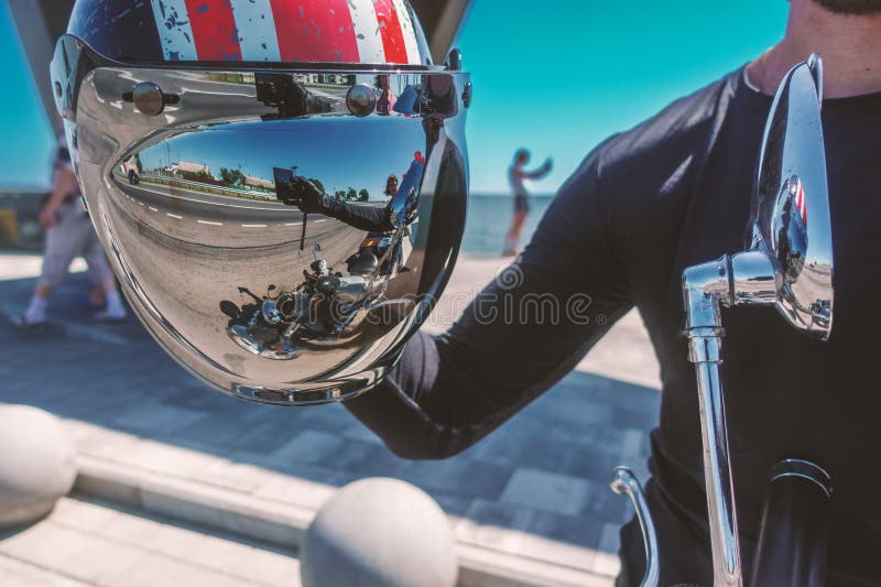 The Man is Holding a Helmet with a Mirrored Visor Stock Image - Image ...