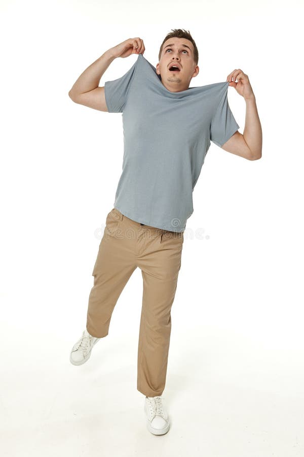 Man Holding Himself by the Shoulders on White Background Stock Photo ...