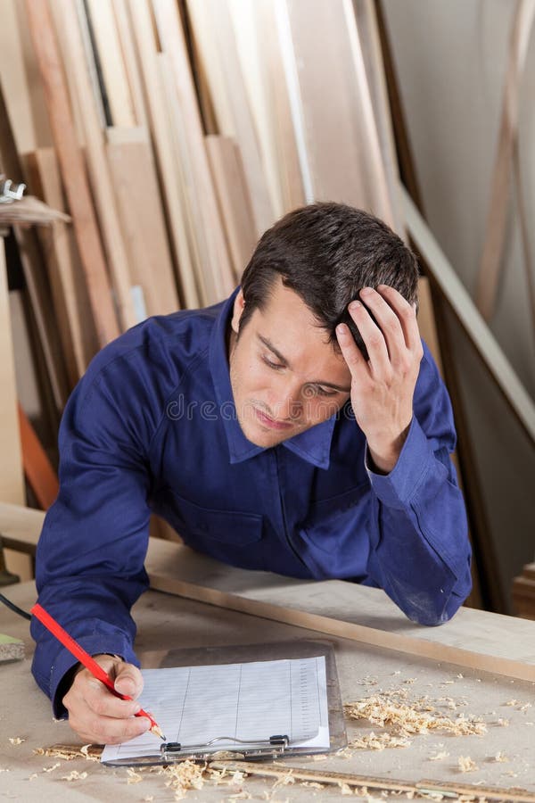 Carpenter in thinking stock photo. Image of measurement - 26079264
