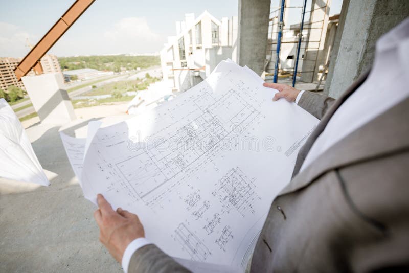 Holding House Plan Drawings on the Structure Stock Photo - Image of ...