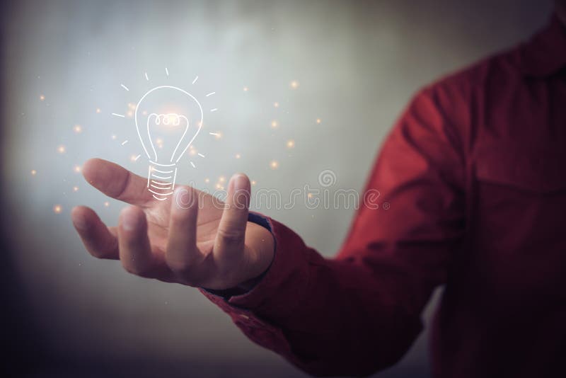 Man Holding Icon Light Bulb,idea Concept,,Presenting New Ideas Stock ...