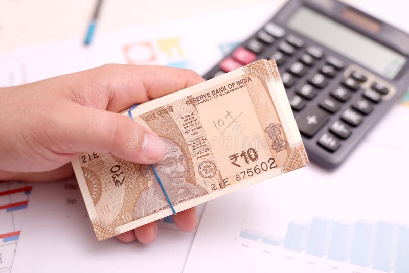 Man is Holding Pack of Indian 10 Rupee Currency Notes in Hand Stock ...