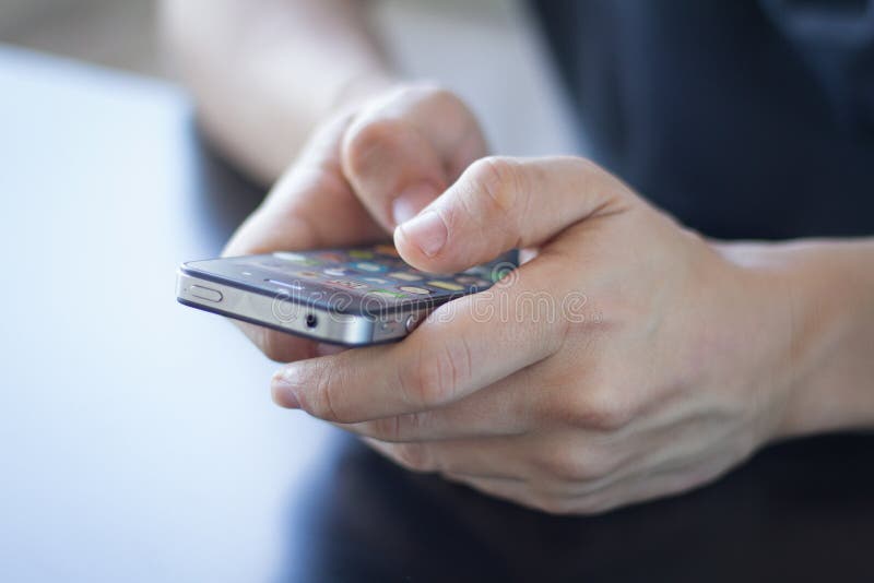 Man Holding an Iphone in Hands Editorial Photography - Image of ...