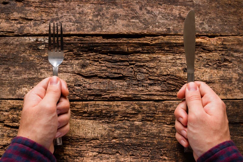 Man Holding Fork and Knife Isolated on White Stock Photo - Image of ...