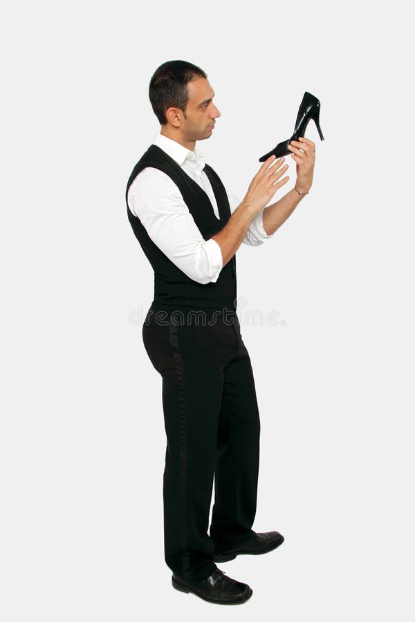 Man holding ladies shoe stock photo. Image of attractive - 16732768