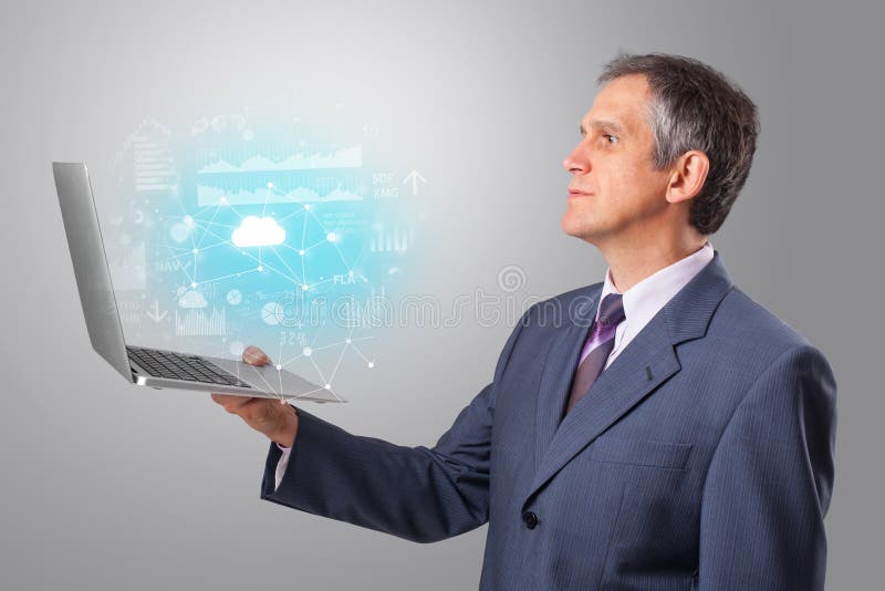 Man Holding Laptop with Cloud Based System Concept Stock Photo - Image ...