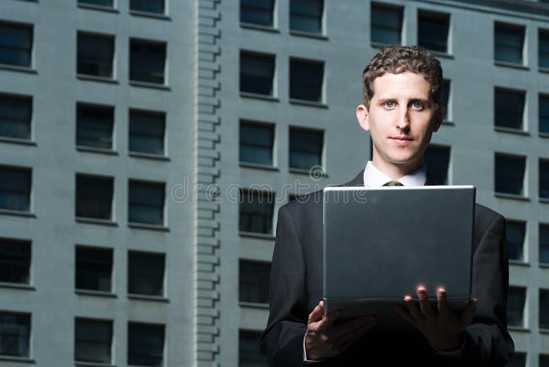 Man Holding a Laptop Computer Stock Photo - Image of office ...