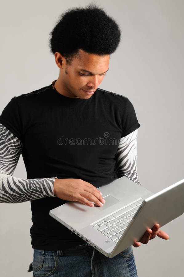 Man Holding Laptop Computer Stock Image - Image of beauty, american ...