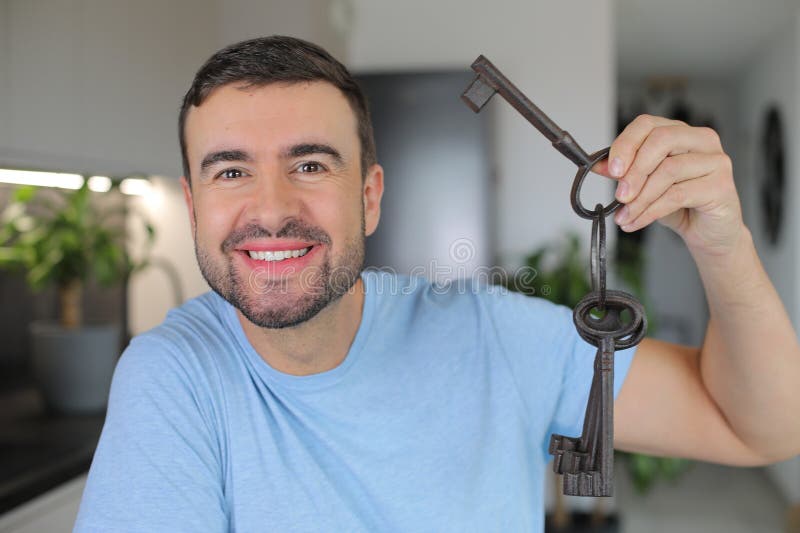 Man Holding Large Ancient Keys Stock Image - Image of holding, singing ...
