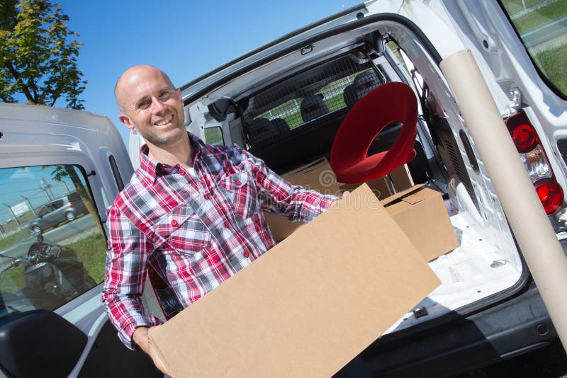 Man Holding Large Box at Back Van Stock Image - Image of mover, blue ...