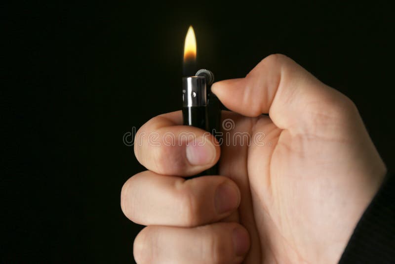 528 Man Holding Lighter Stock Photos - Free & Royalty-Free Stock Photos ...
